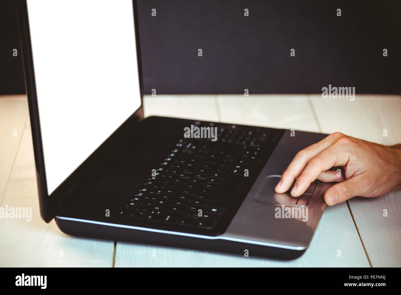 Man using his laptop Stock Photo - Alamy