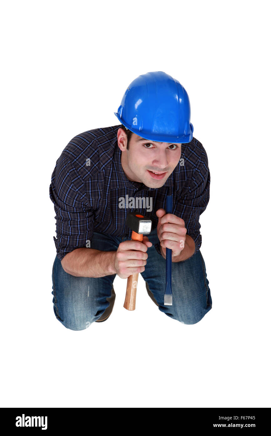 Man bending over holding Cut Out Stock Images & Pictures - Alamy