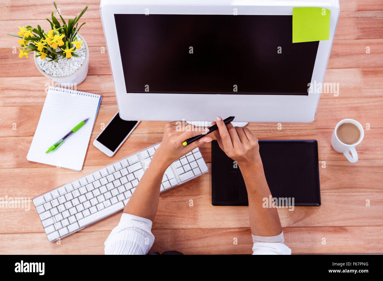 Part of hand using stylus Stock Photo - Alamy