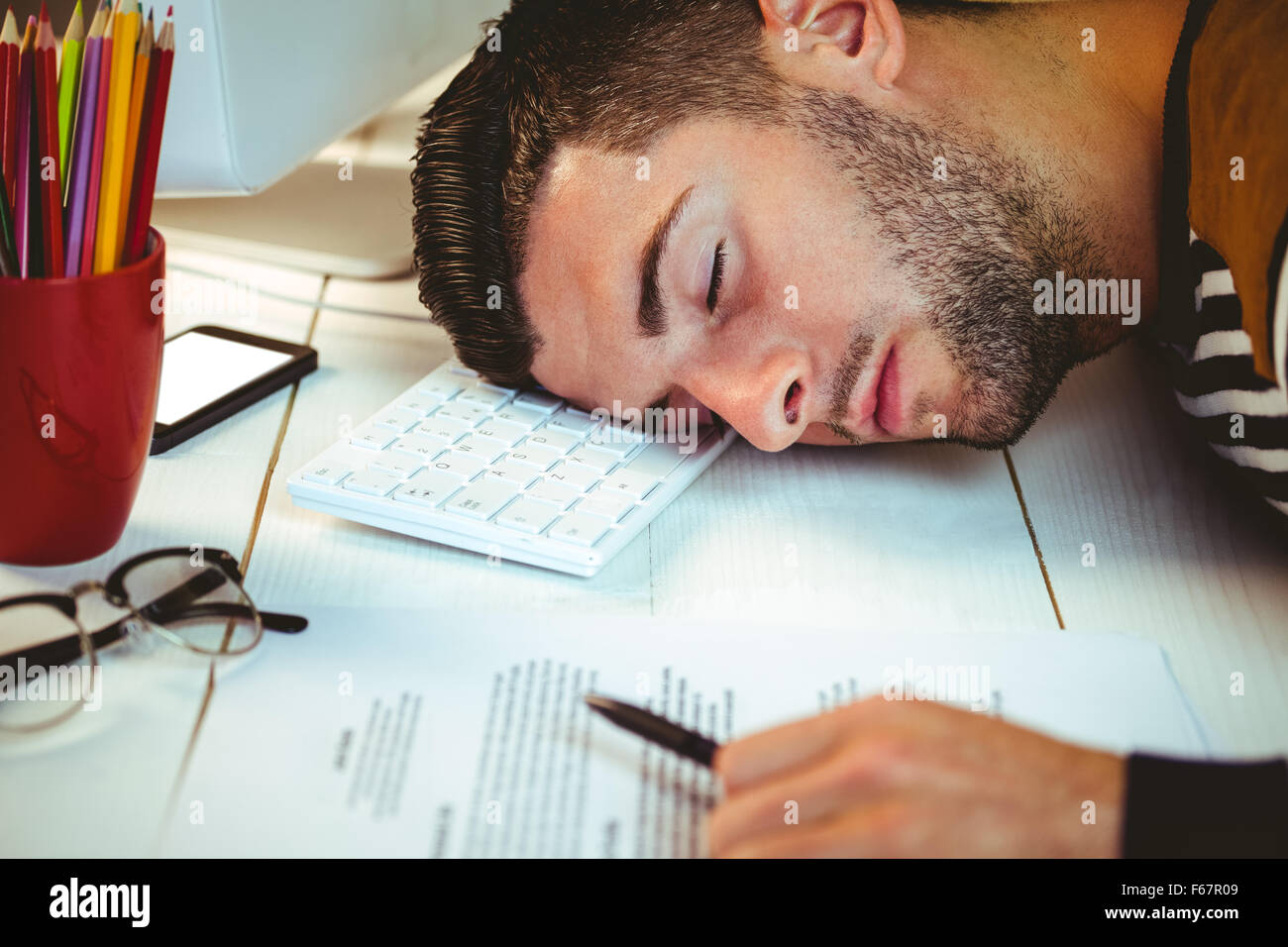 Man asleep at his desk Stock Photo - Alamy