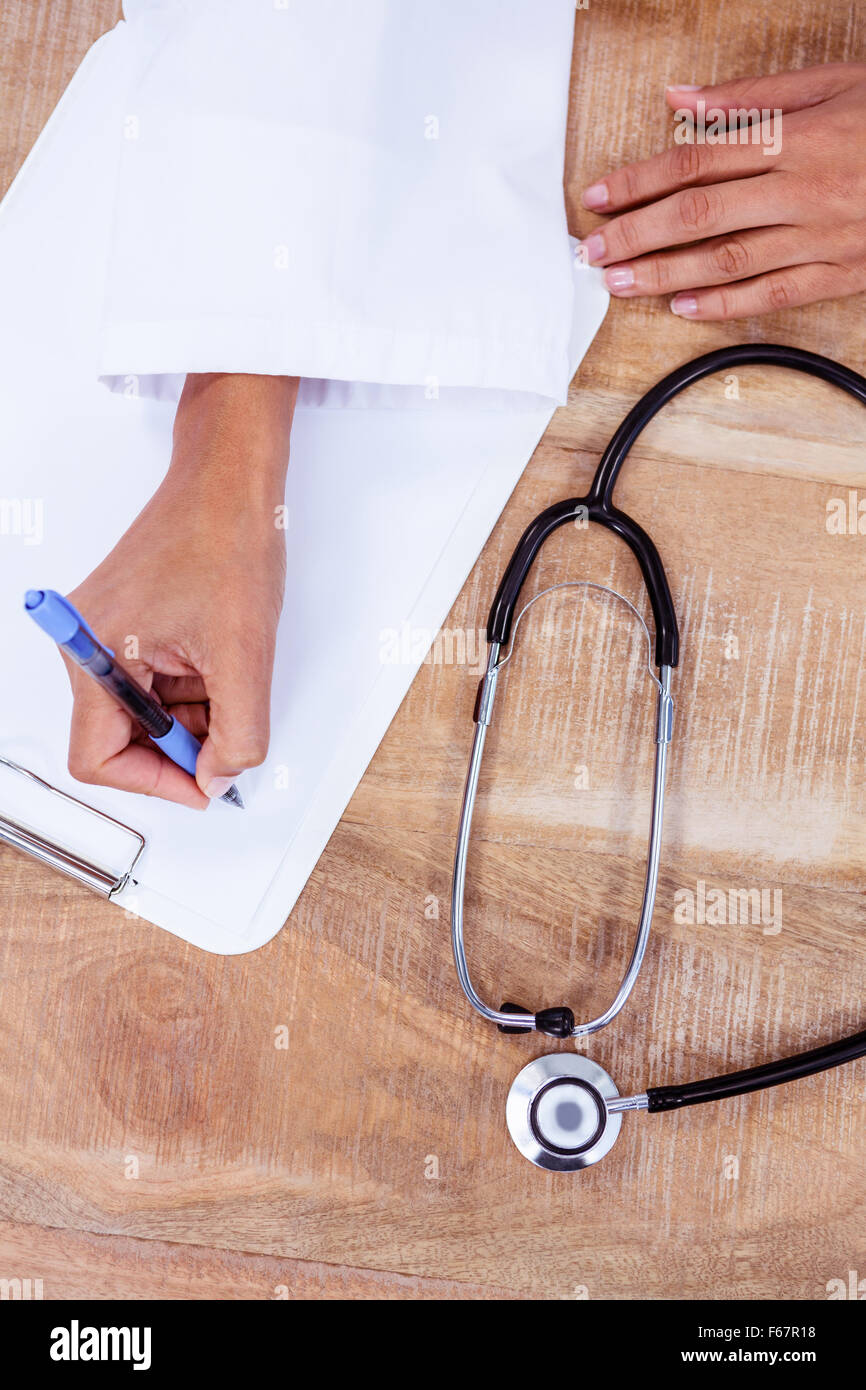 Doctor holding patient writing clipboard hi-res stock photography and ...