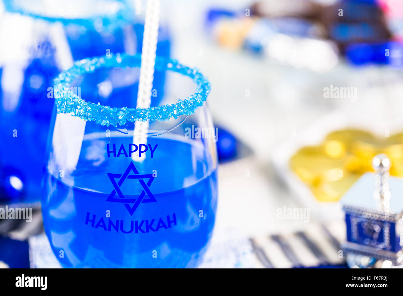 Table set with cocktails and chocolates to celebrate Hanukkah Stock ...