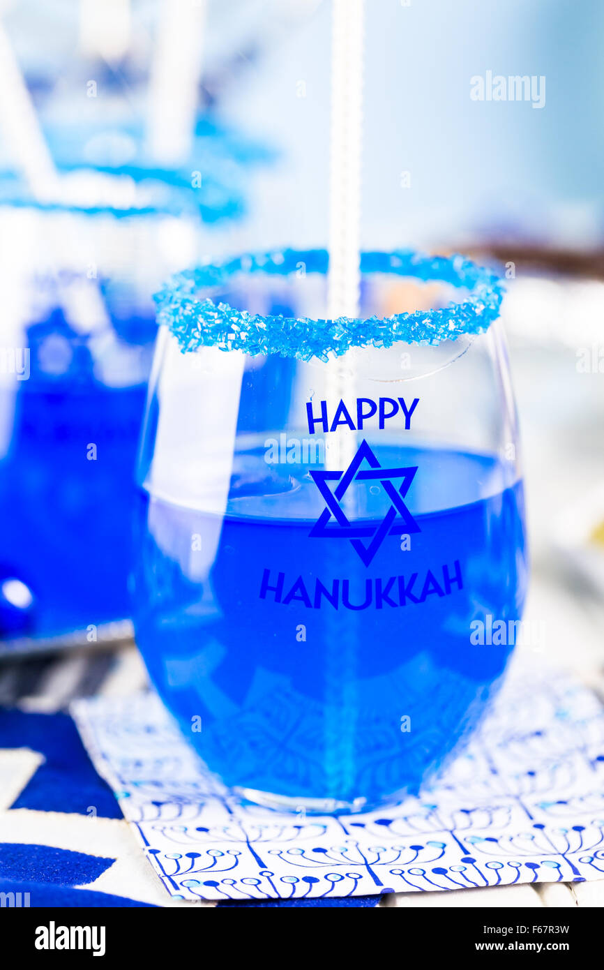 Table set with cocktails and chocolates to celebrate Hanukkah Stock ...