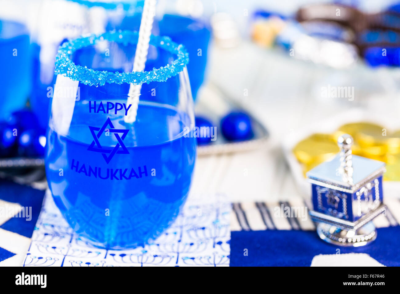 Table set with cocktails and chocolates to celebrate Hanukkah Stock ...