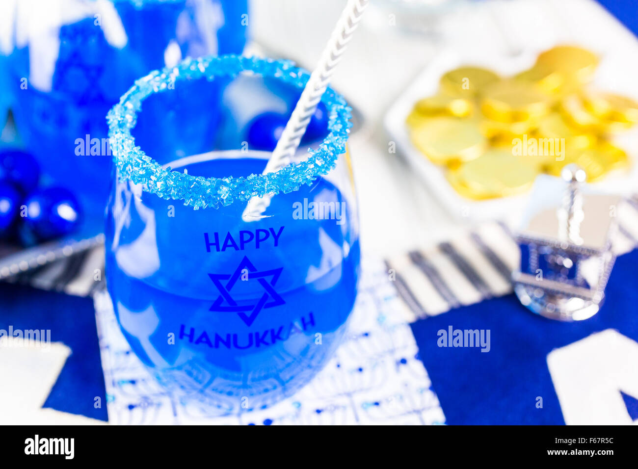 Table set with cocktails and chocolates to celebrate Hanukkah Stock ...