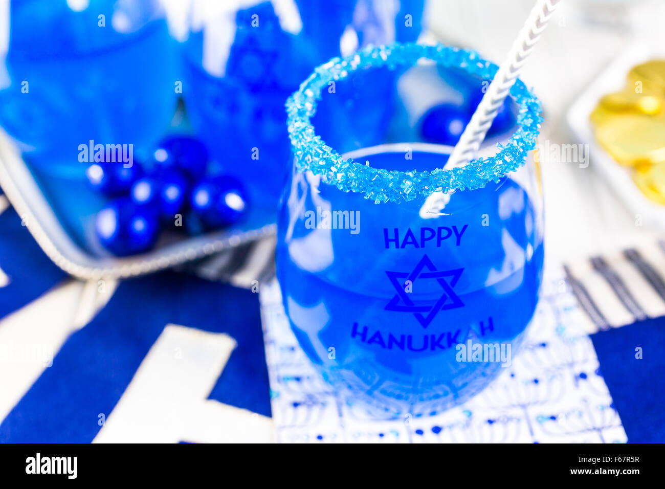 Table set with cocktails and chocolates to celebrate Hanukkah Stock ...