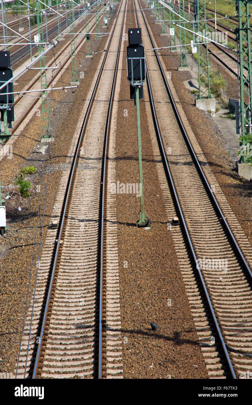 Long straight railroad tracks seen from a bridge Stock Photo - Alamy