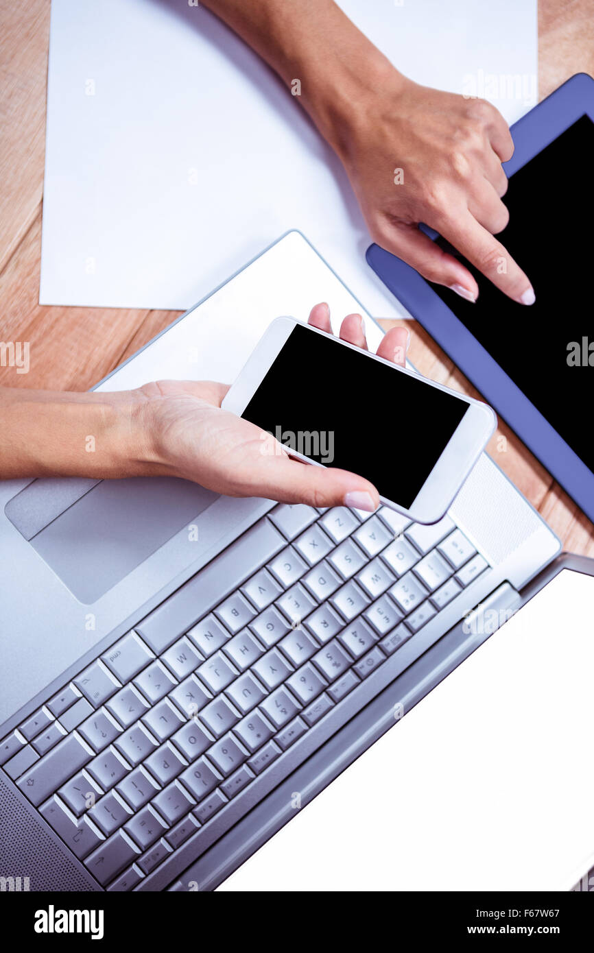 Woman scrolling smartphone desk hi-res stock photography and images - Alamy