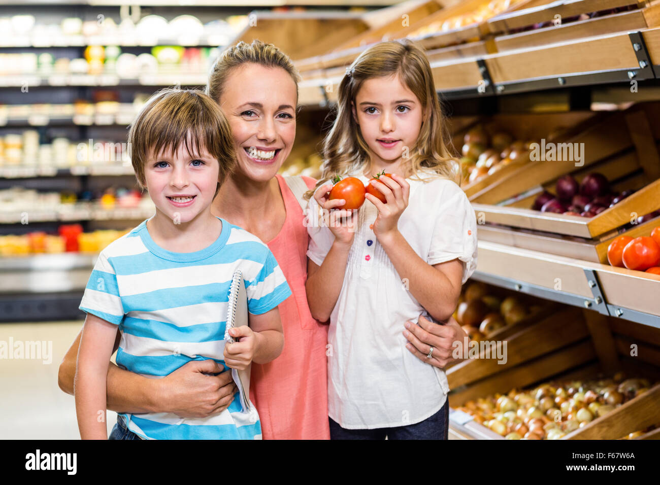Young family doing some shopping Stock Photo - Alamy