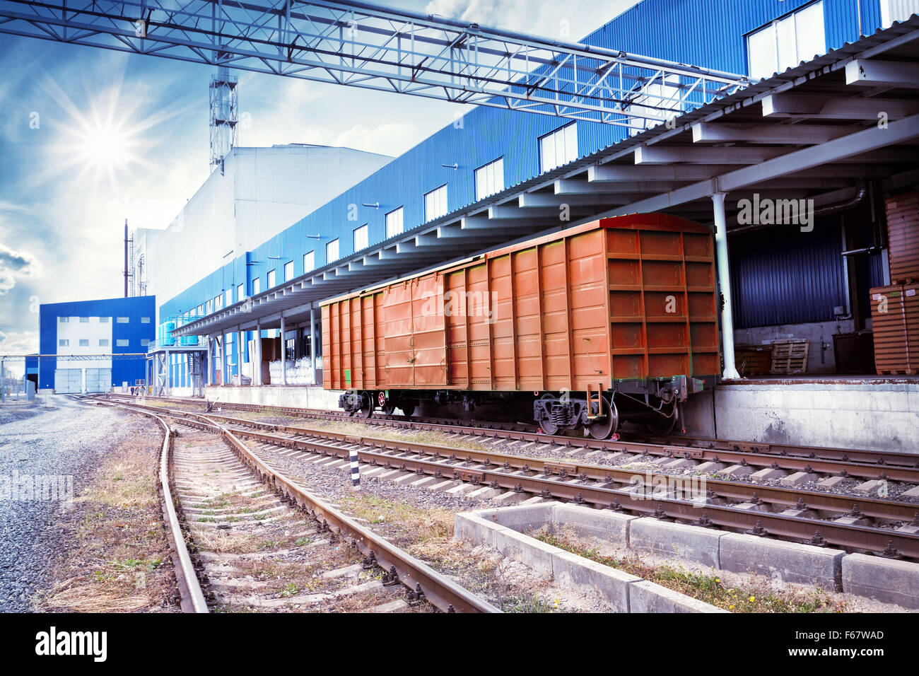 Red cars for loading goods in stock Stock Photo - Alamy