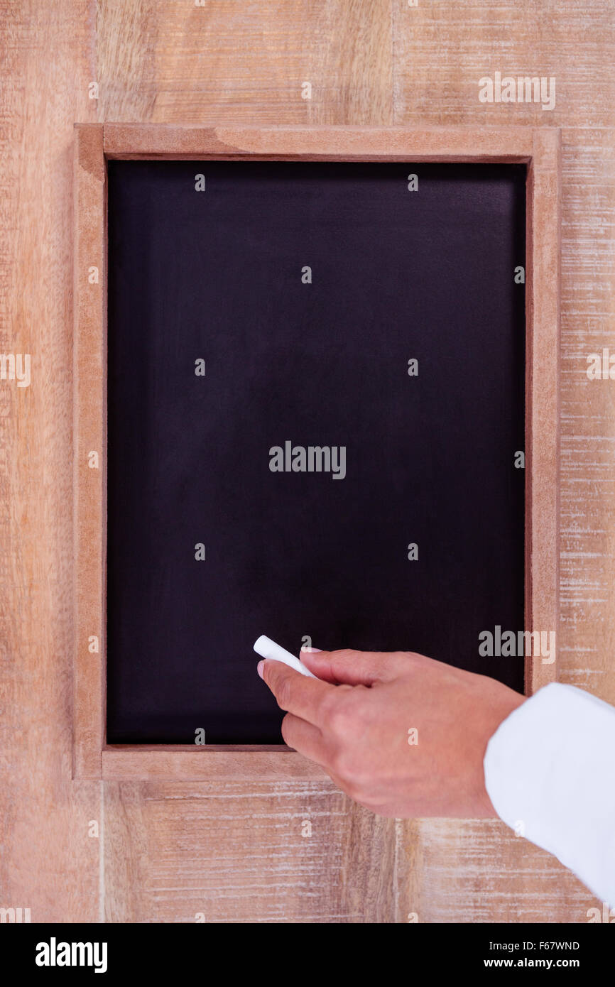 View of hand writing on blackboard Stock Photo - Alamy