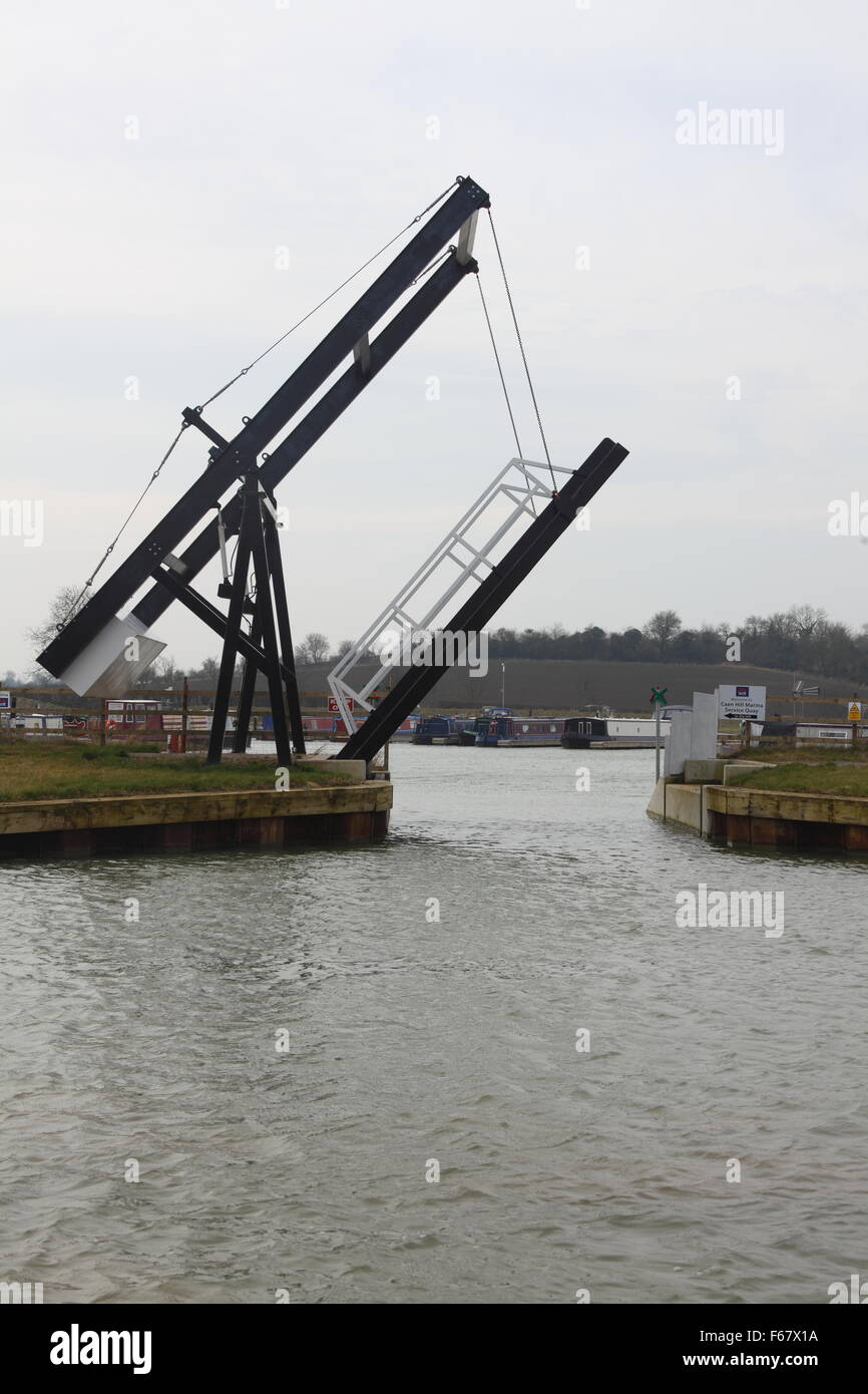 A steel girder lift bridge in the raised position to allow barges to ...