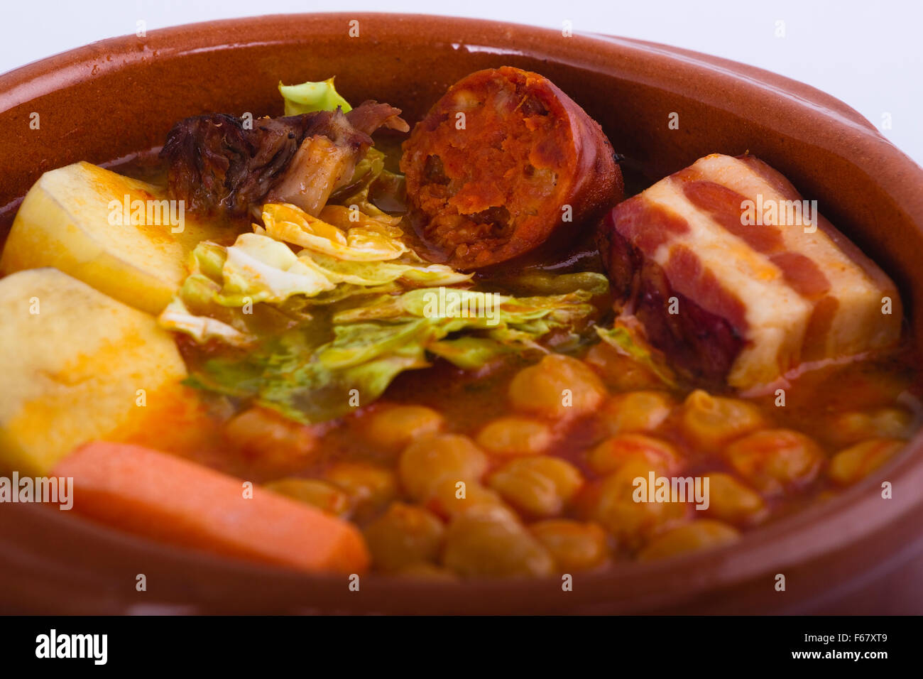 Madrid stew on earthenware pot, spanish food Stock Photo - Alamy