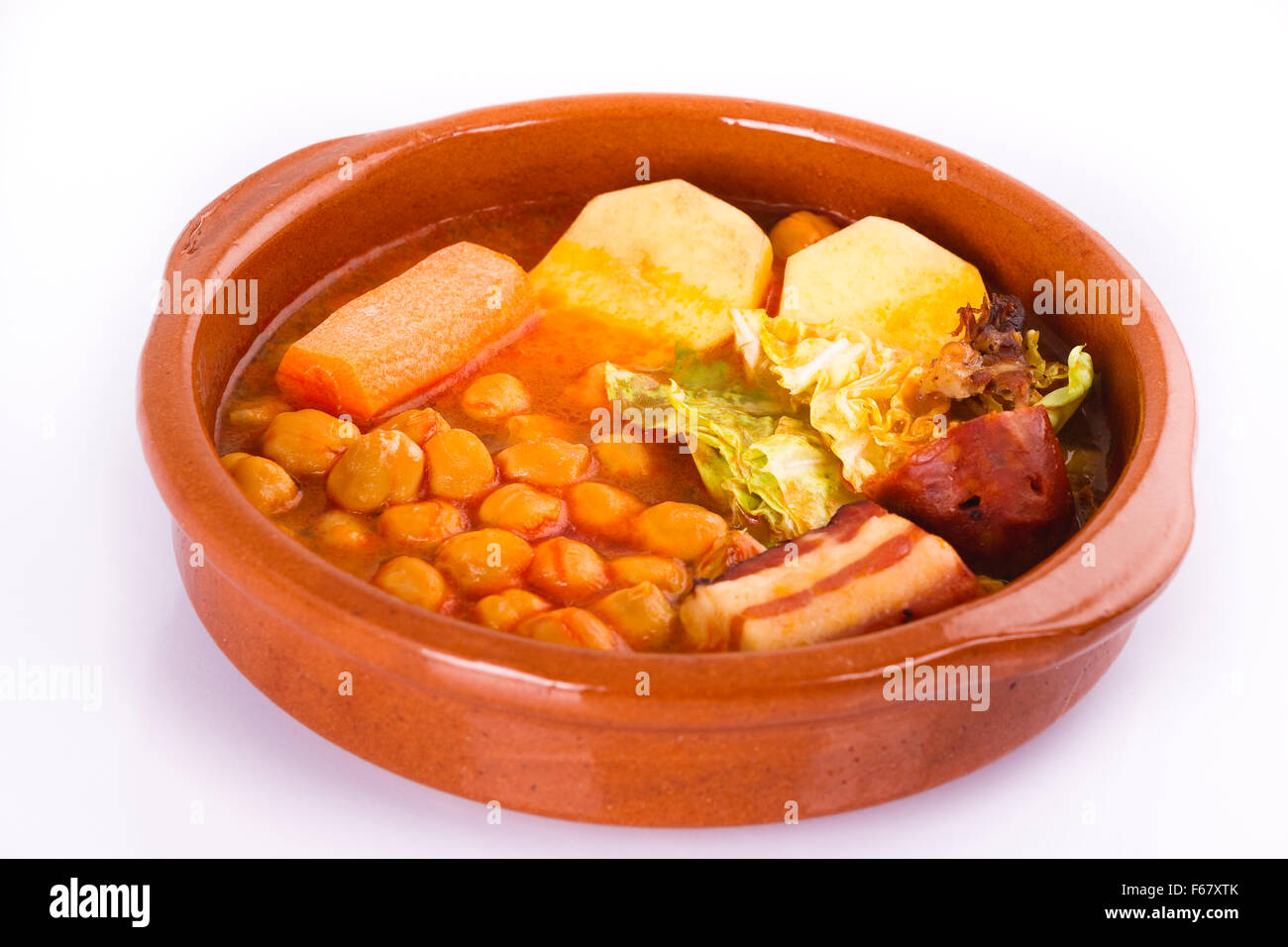 Madrid stew on earthenware pot, spanish food Stock Photo - Alamy