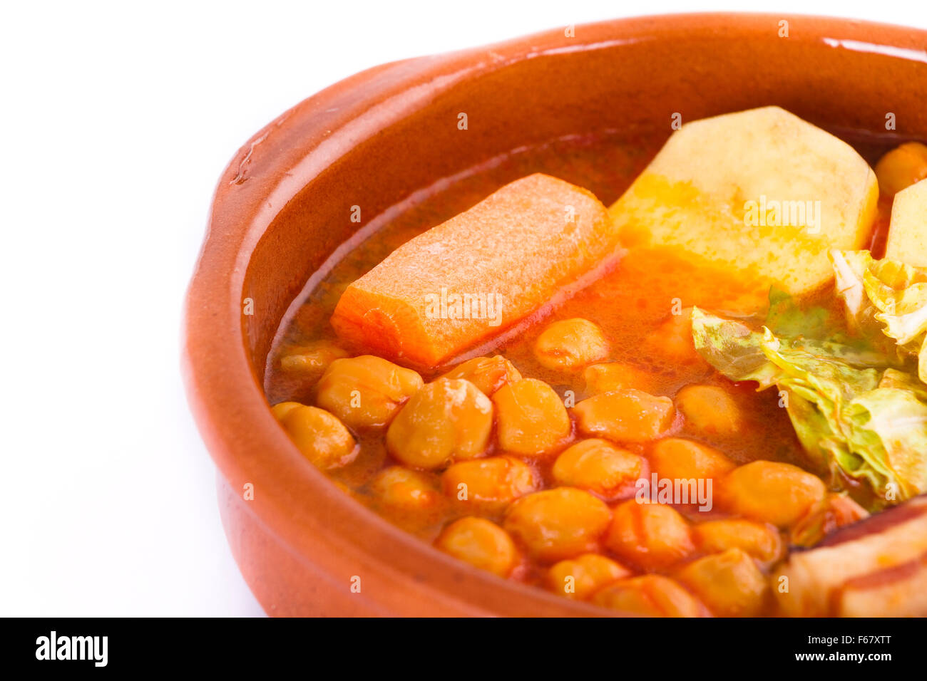 Madrid stew on earthenware pot, spanish food Stock Photo - Alamy