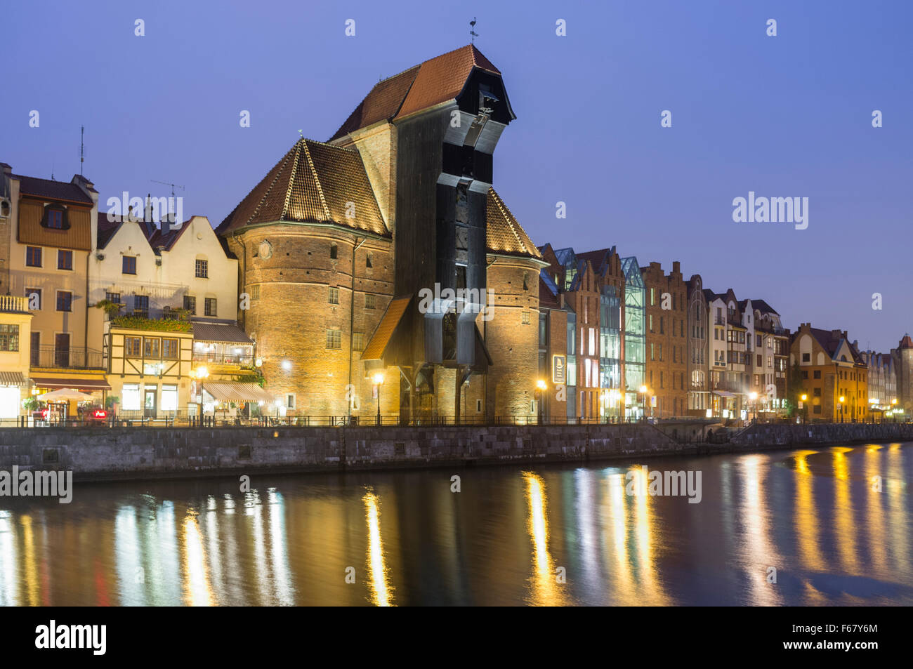 Medieval crane waterfront tenements reflected hi-res stock photography ...