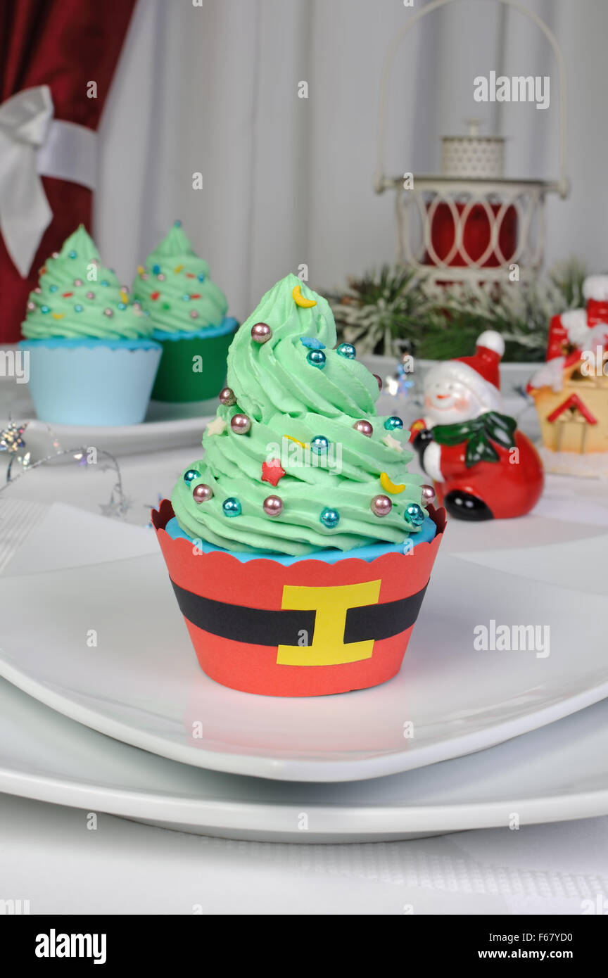 Christmas muffins in a tree with stars and balloons Stock Photo - Alamy