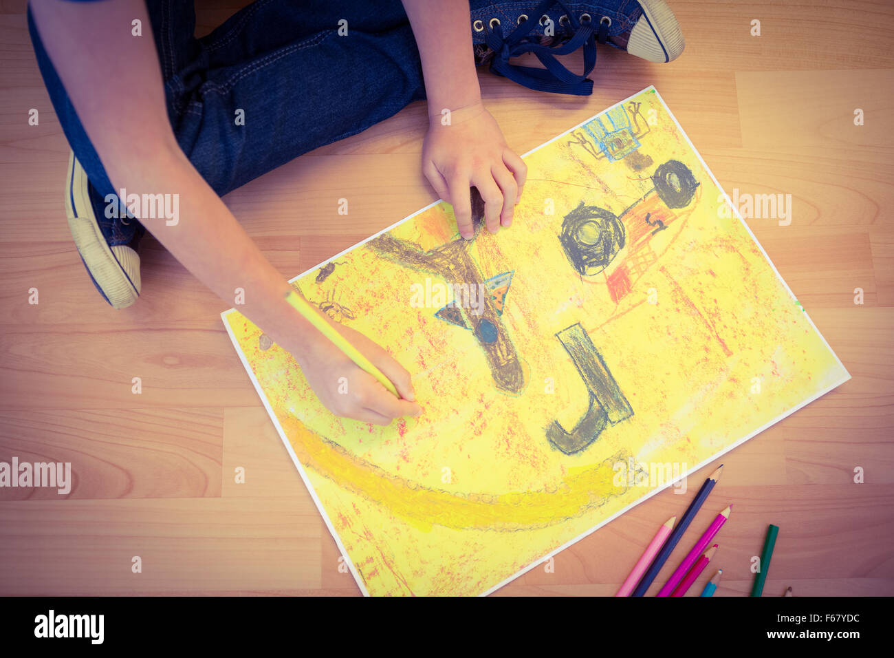Small boy drawing on paper Stock Photo - Alamy