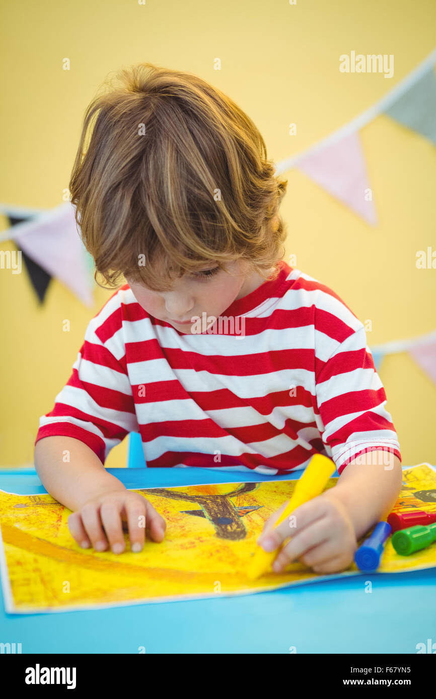 Small boy colouring in picture hi-res stock photography and images - Alamy