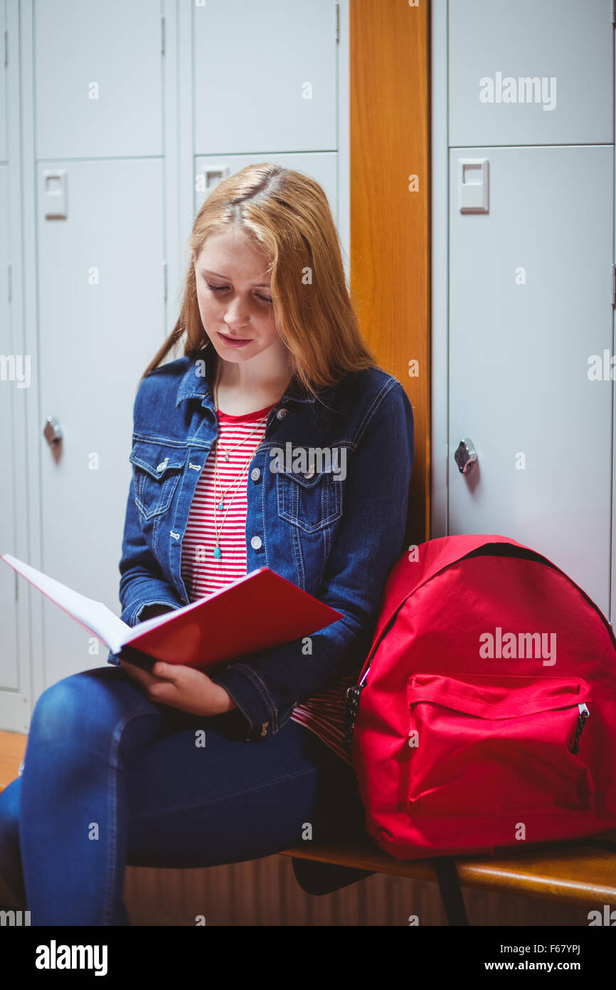 Focused student sitting and studying on notebook Stock Photo - Alamy