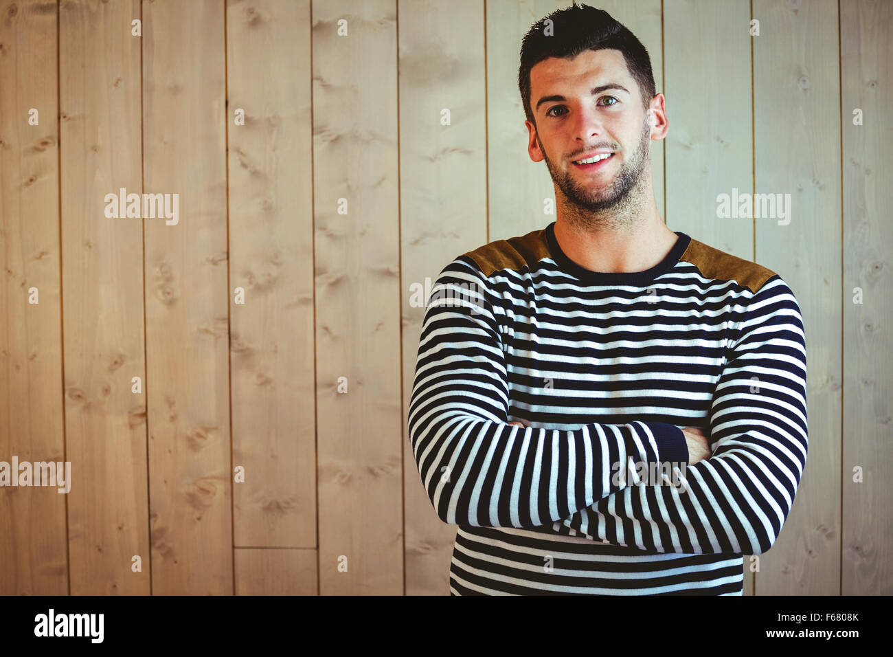 Handsome hipster posing for camera Stock Photo - Alamy