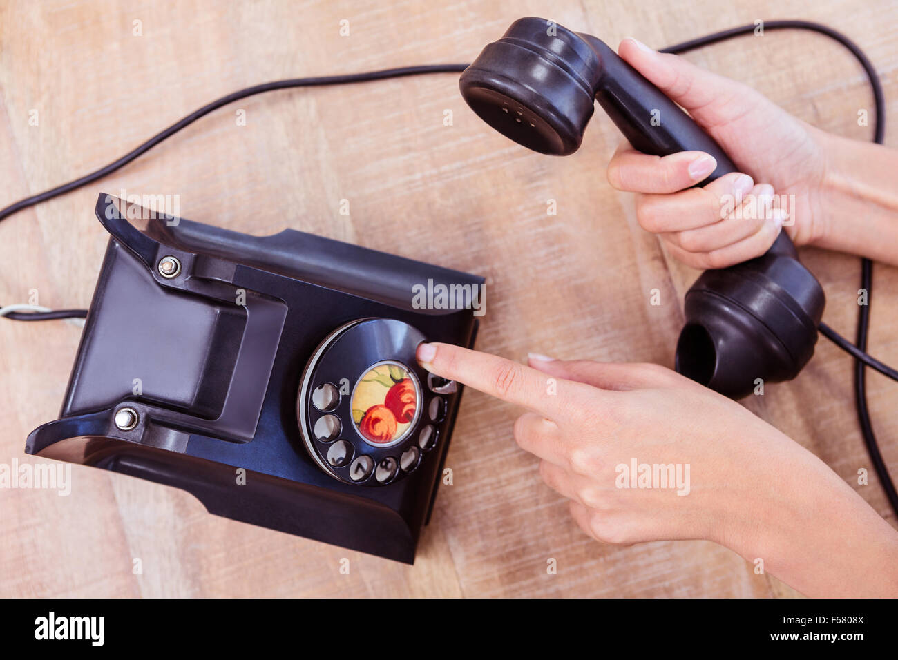 Parts of hands using old phone Stock Photo - Alamy