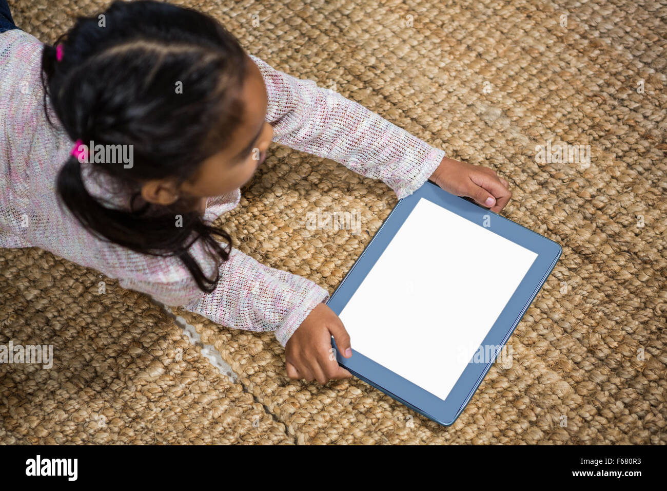 Happy young children using tablet Stock Photo - Alamy