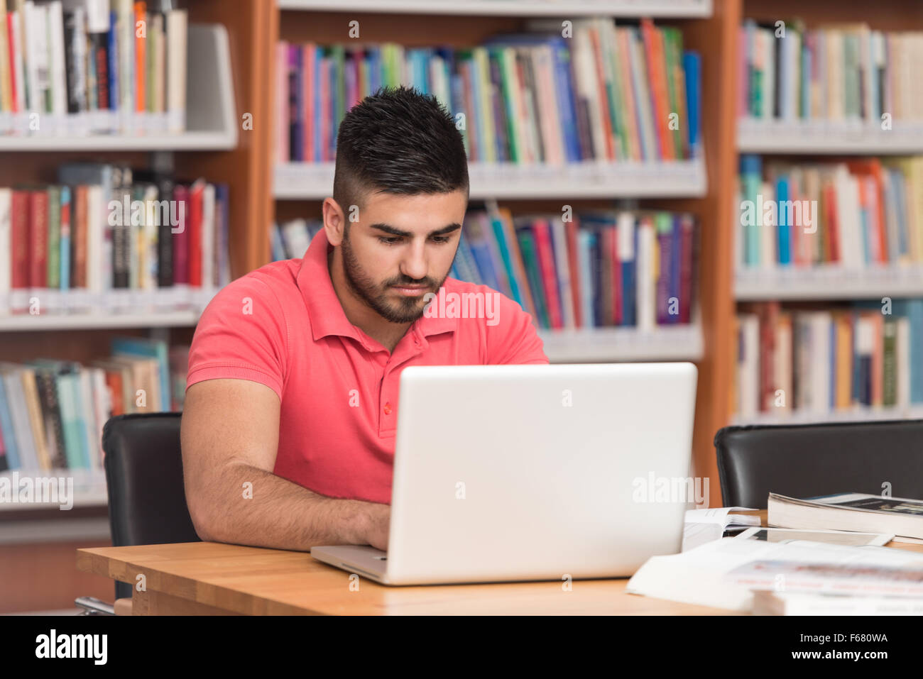 Arabic Male College Student Stressed About His Homework Stock Photo - Alamy