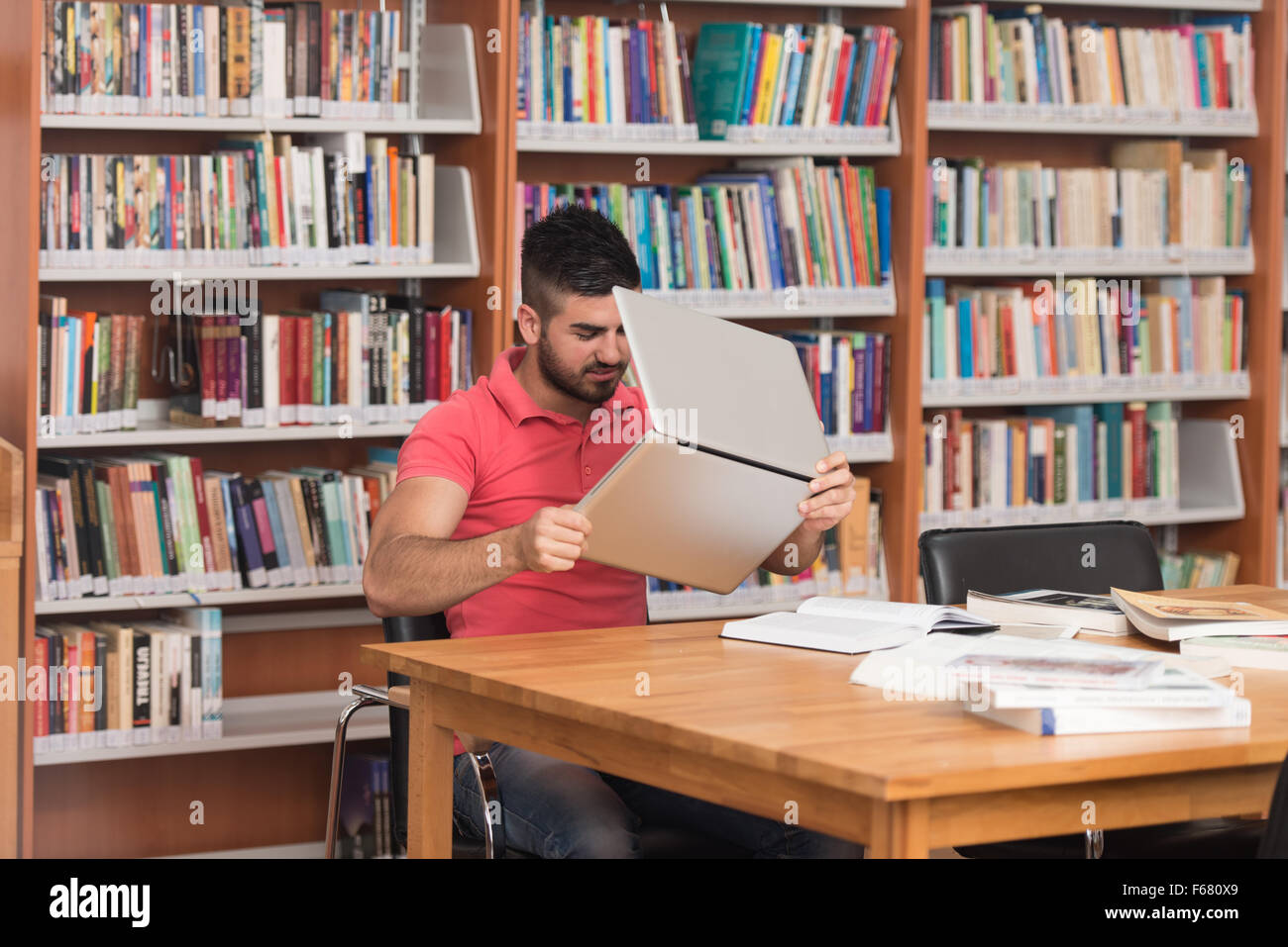 Arabic Male College Student Stressed About His Homework Stock Photo - Alamy
