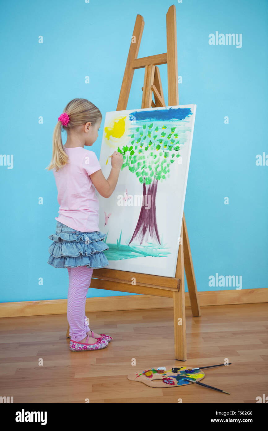 Girl painting her colourful picture Stock Photo - Alamy