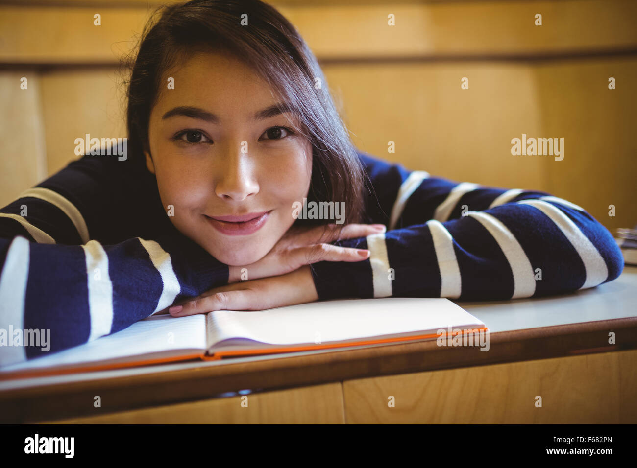 Smiling student in lecture hall Stock Photo - Alamy Smiling student in lecture hall Stock Photo - Alamy