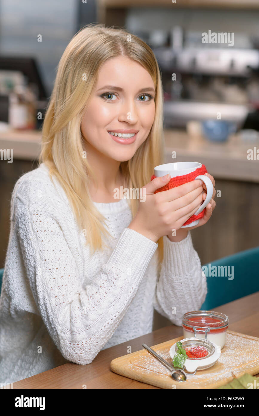 Beautiful woman sitting in bistro hi-res stock photography and images ...