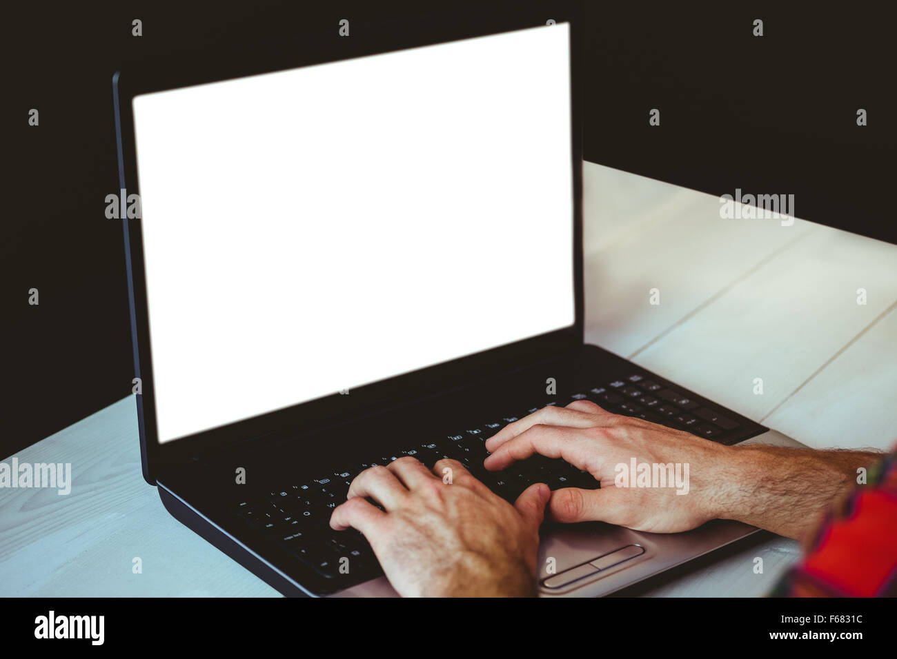 Man using his laptop Stock Photo - Alamy