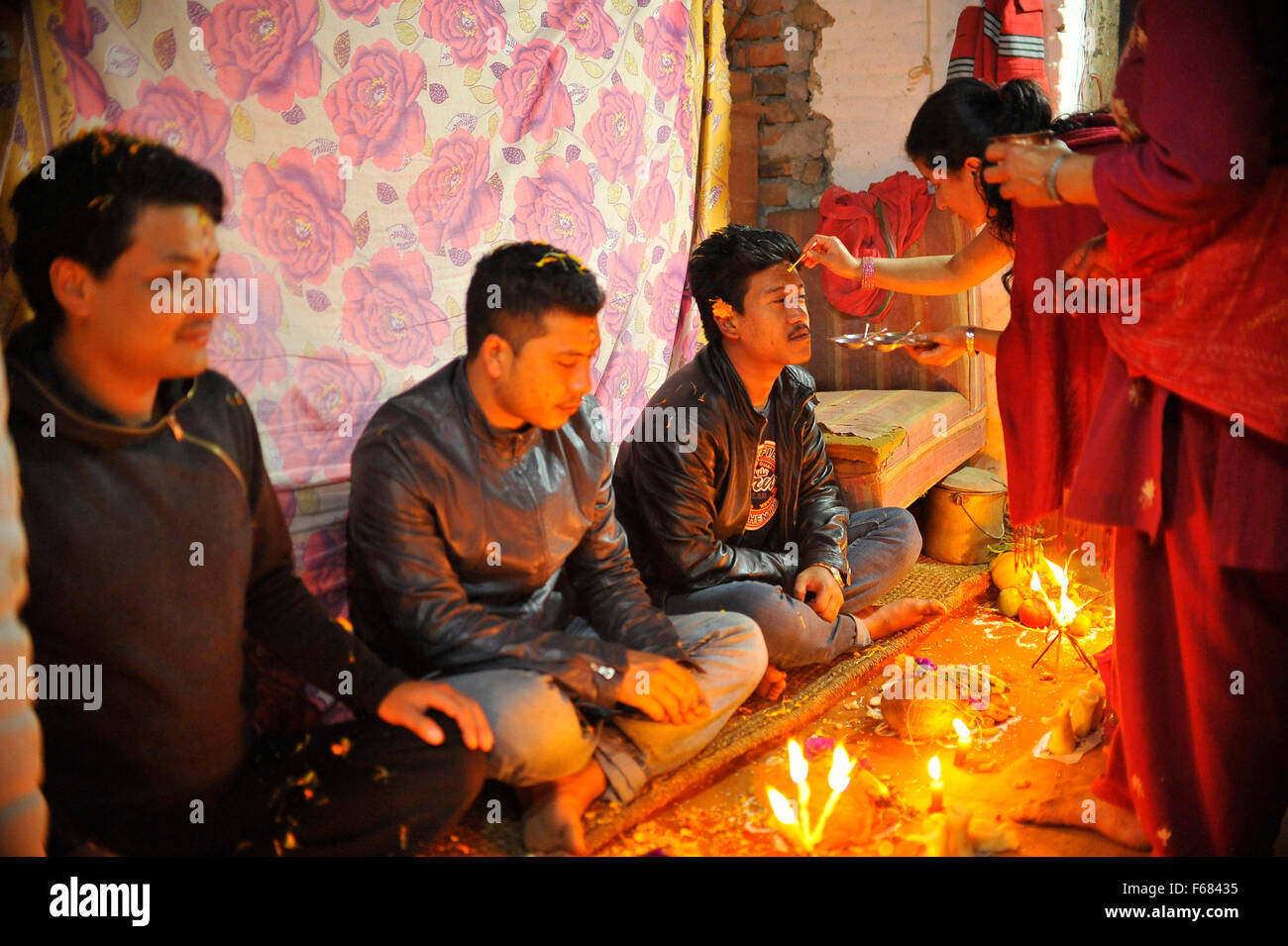 Kathmandu, Nepal. 13th Nov, 2015. A girl applies seven layers of ...