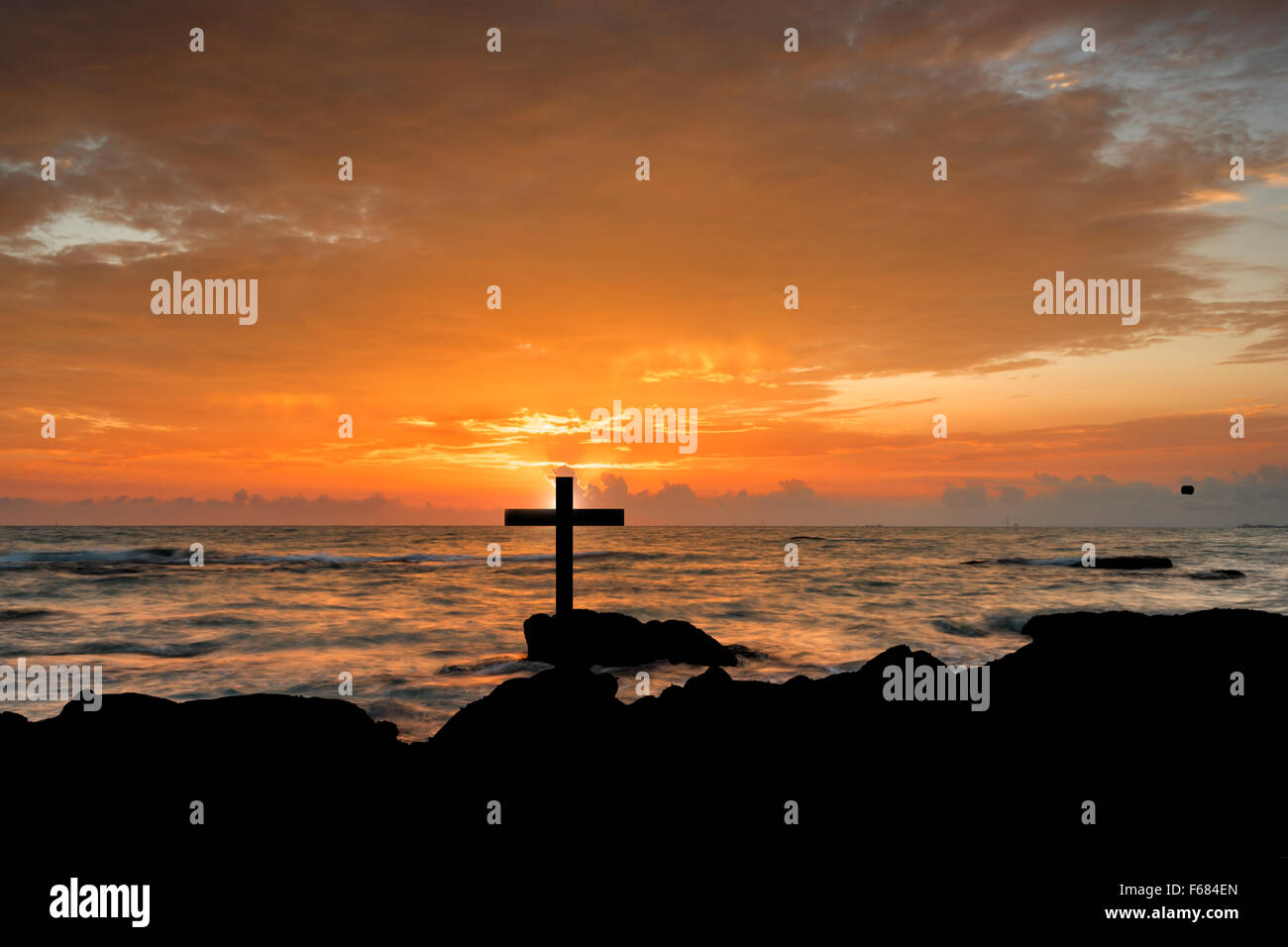 Silhouette Jesus and the cross over sunset Stock Photo - Alamy