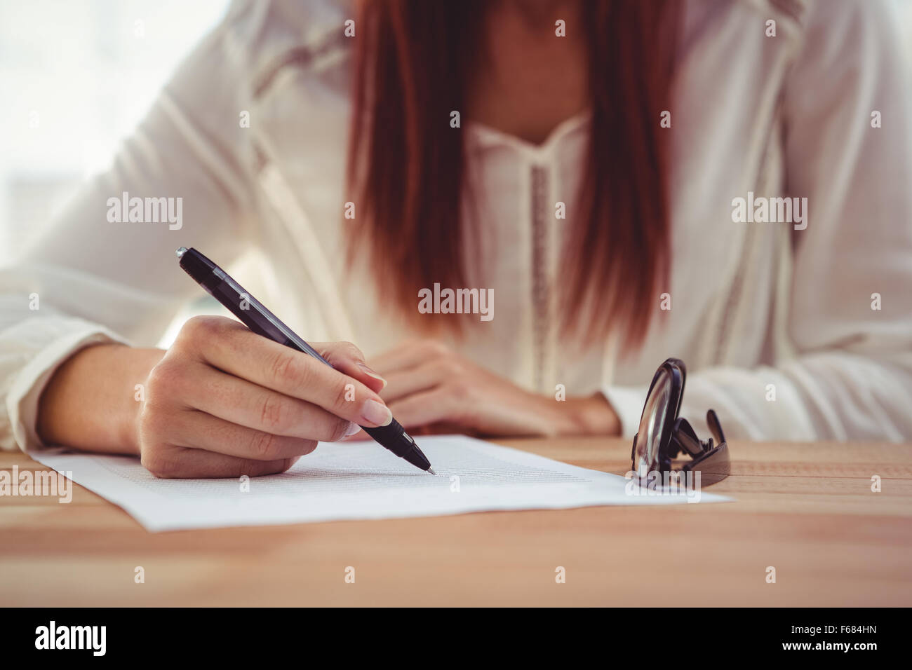 Cropped image of woman drawing Stock Photo - Alamy