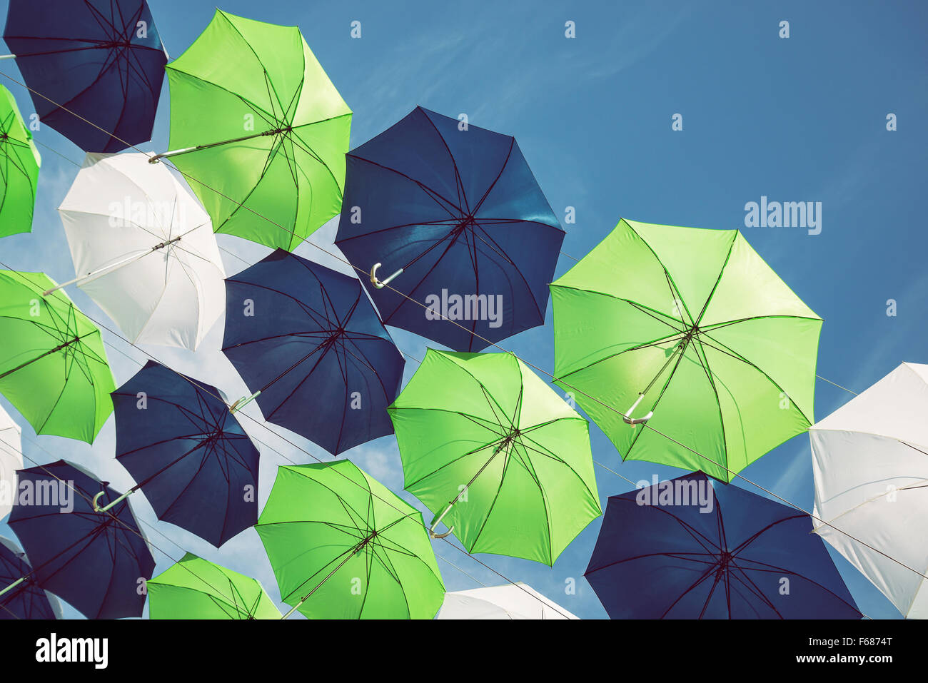 Group of umbrellas against blue sky Stock Photo - Alamy