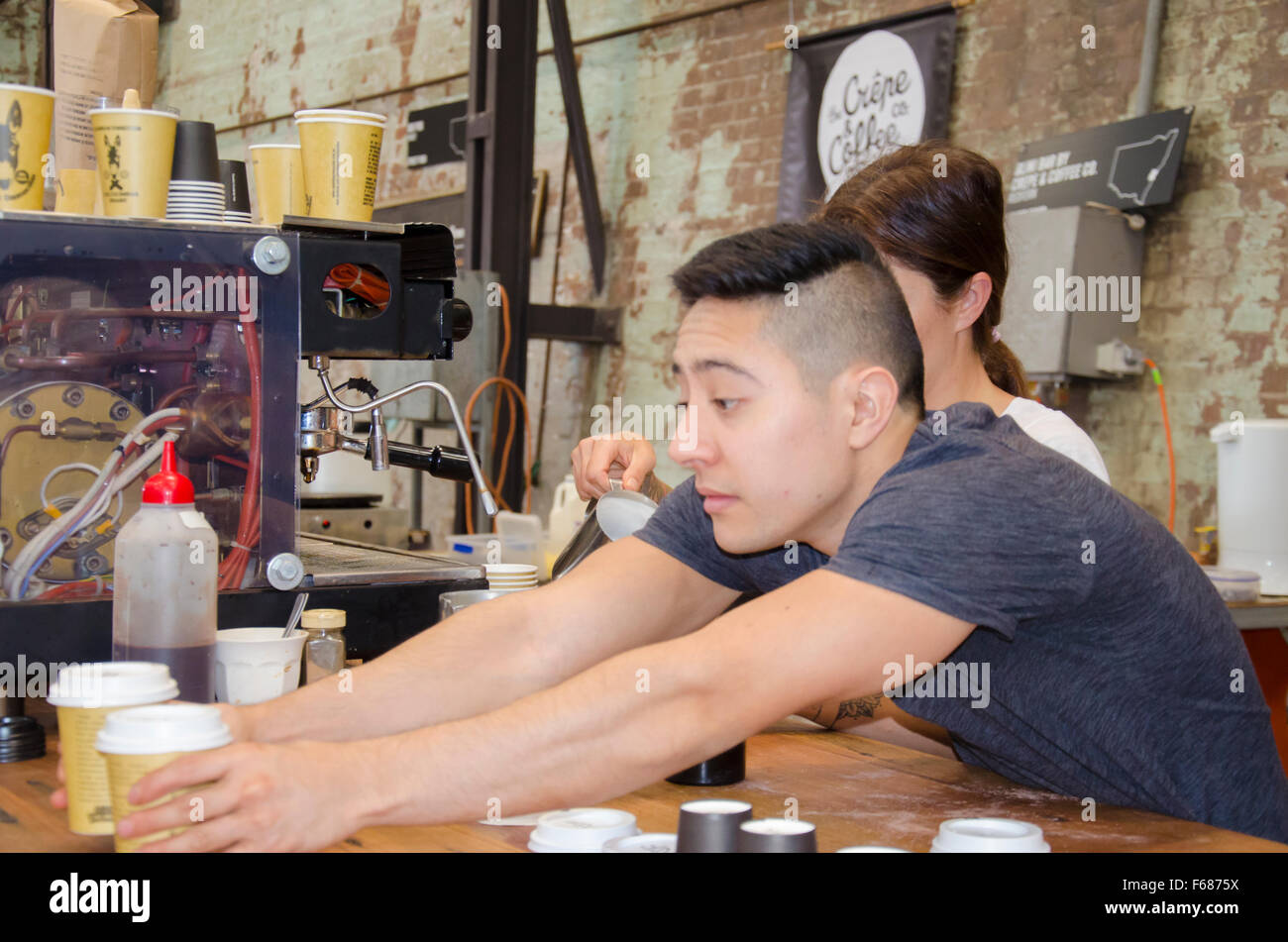 A Barista serving coffee at a market in Sydney, Australia Stock Photo ...