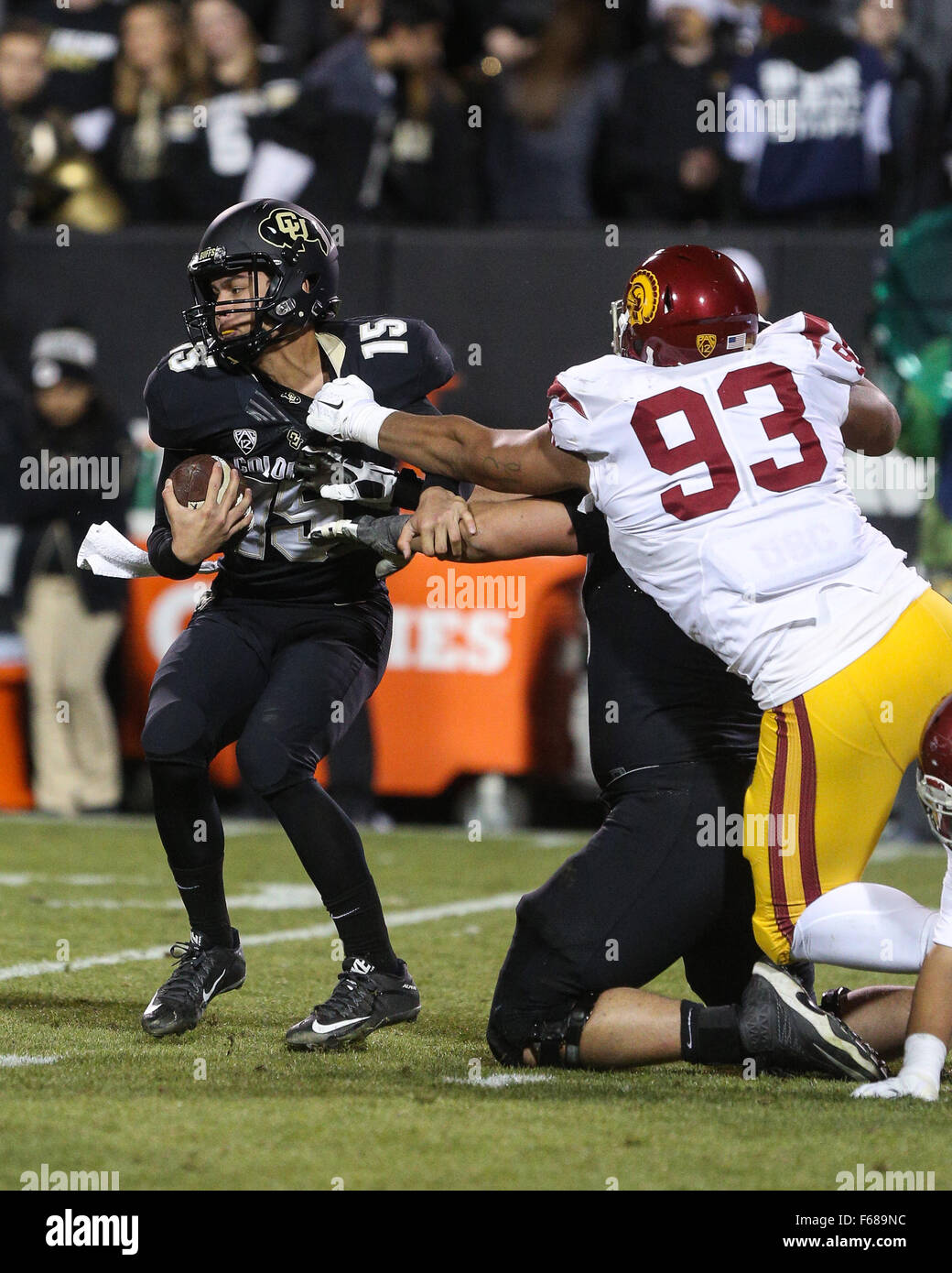 Boulder. 13th Nov, 2015. Colorado QB Cade Apsay can't escape USC's Greg ...