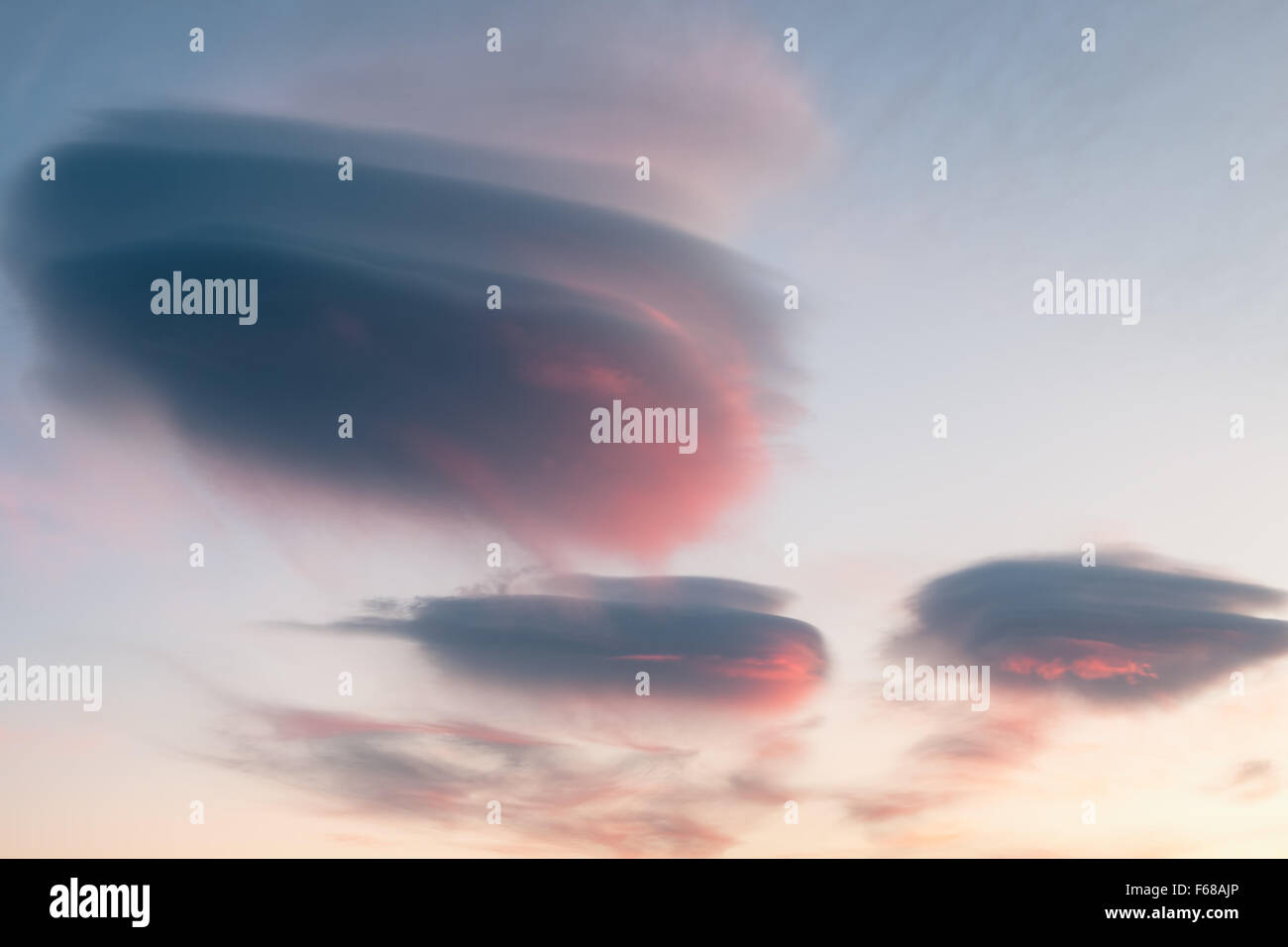 Lenticular clouds, aka UFO clouds, at sunset Stock Photo - Alamy