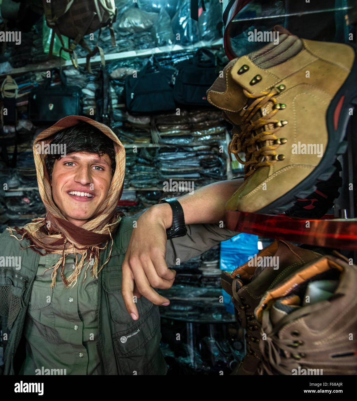 Portrait of a shoe vendor in Bush bazaar, black market in Kabul ...