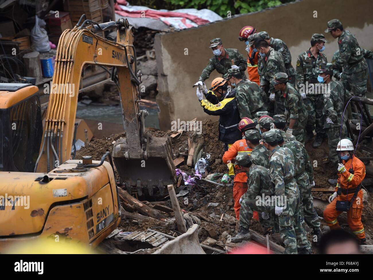 Lishui, China's Zhejiang Province. 14th Nov, 2015. Rescuers work at the ...