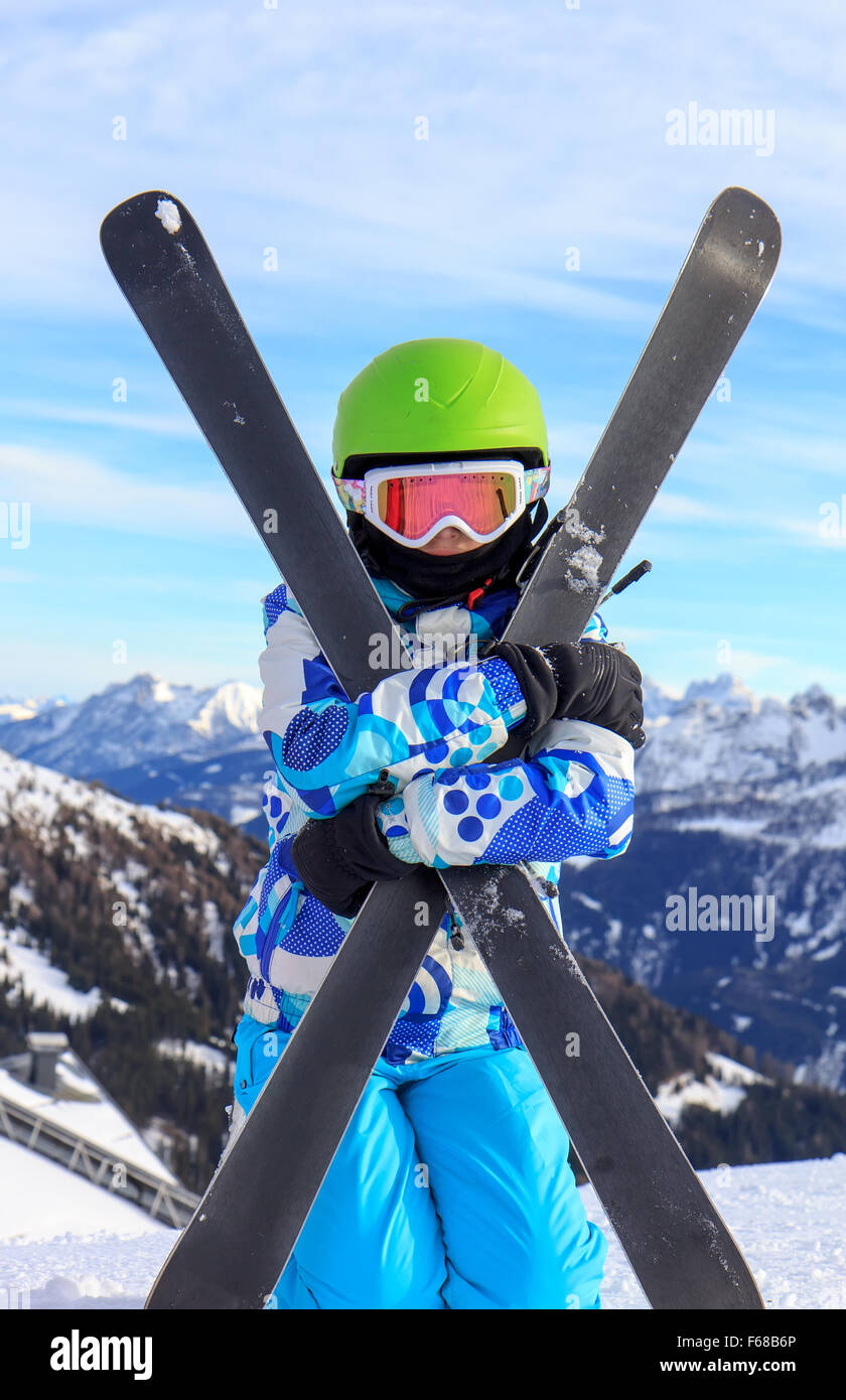 Girl with ski on the snow Stock Photo - Alamy