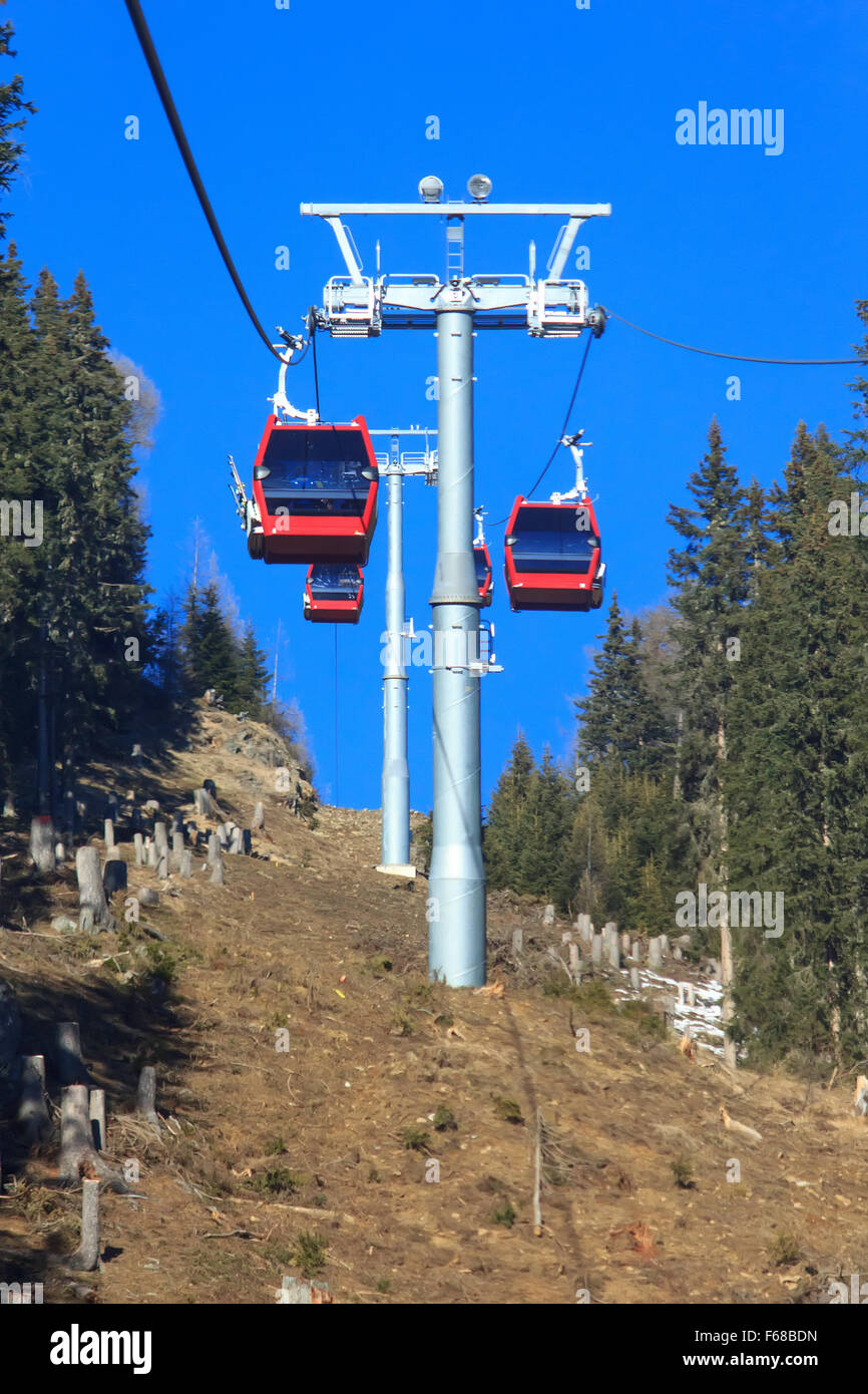 Red cable car in the mountains Stock Photo - Alamy