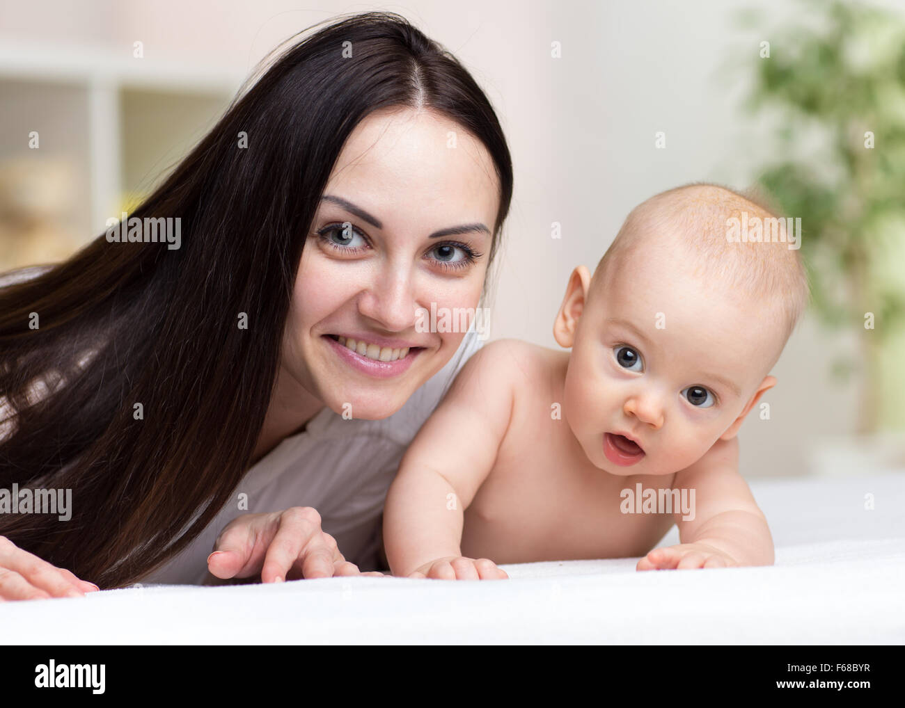 Portrait of happy mother and baby Stock Photo - Alamy
