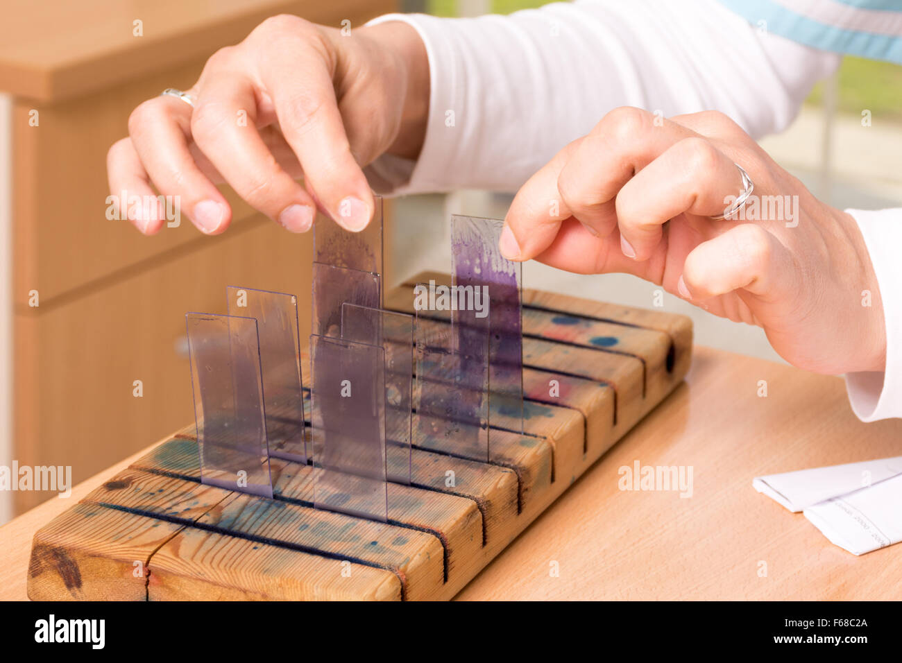 Chemical examination of samples from people Stock Photo - Alamy