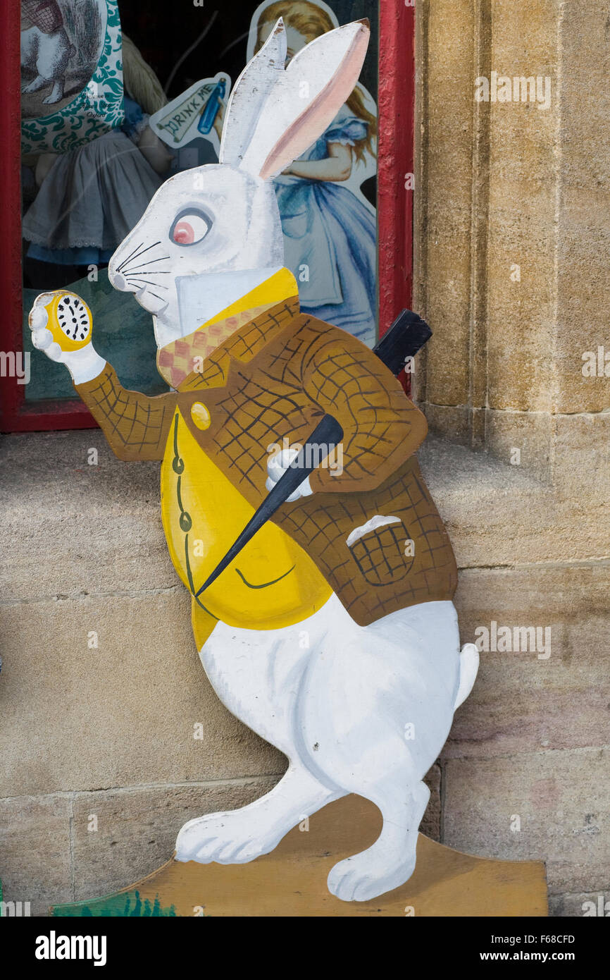 Alice in wonderland statue at the Alice Shop in Oxford Stock Photo - Alamy