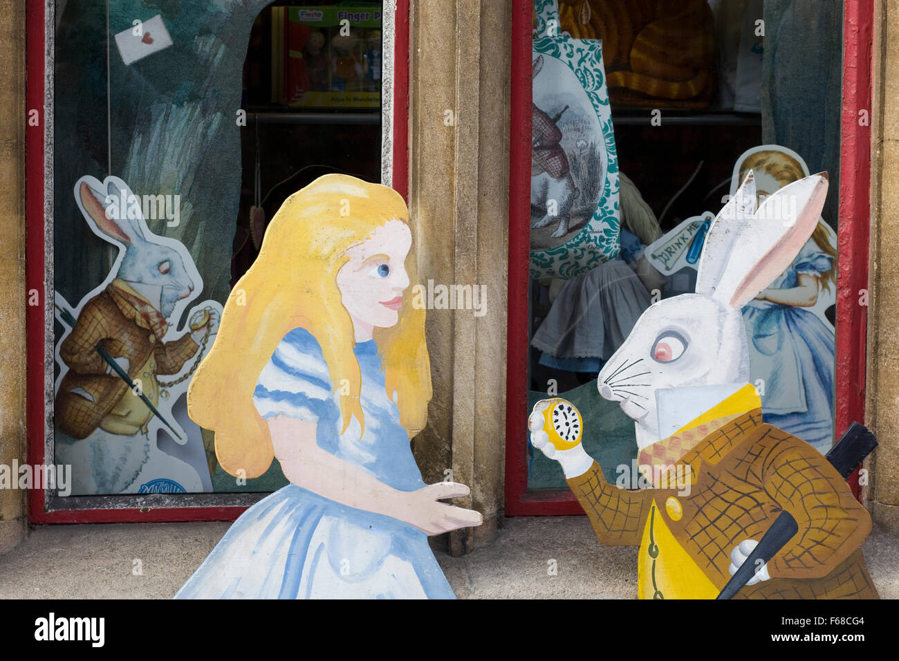 Alice in wonderland statue at the Alice Shop in Oxford Stock Photo - Alamy