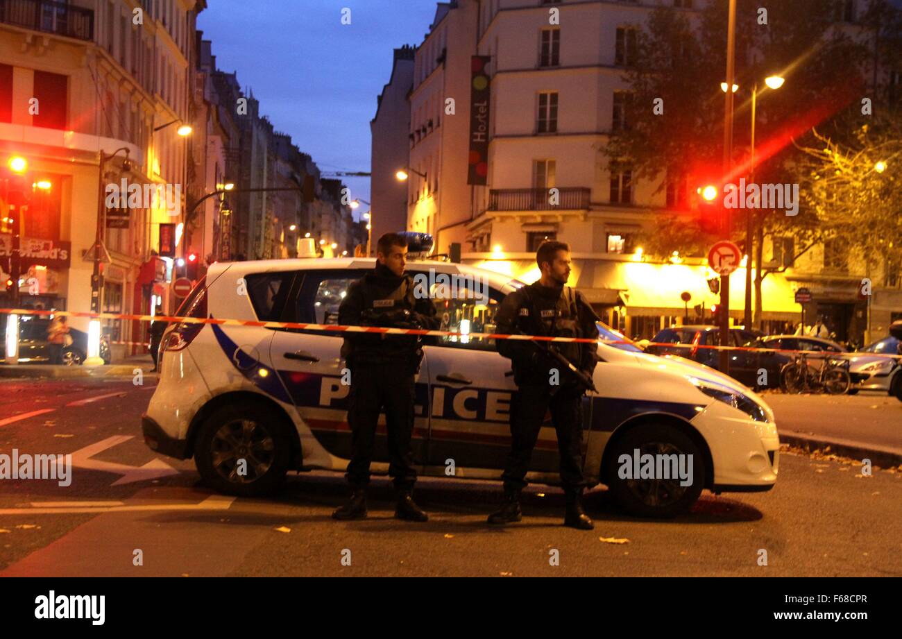 Paris, France. 14th Nov, 2015. French police stand guard on a street in ...