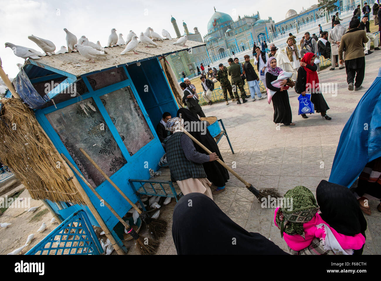 Park with white pigeons around the Shrine of Ali in Mazar-i Sharif ...